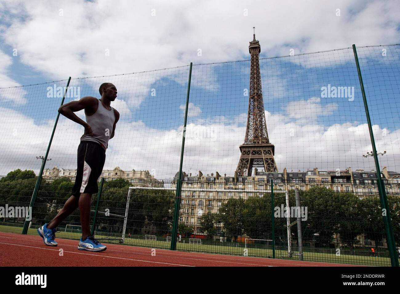 Jamaican sprinter Usain Bolt attends a training session next to the ...