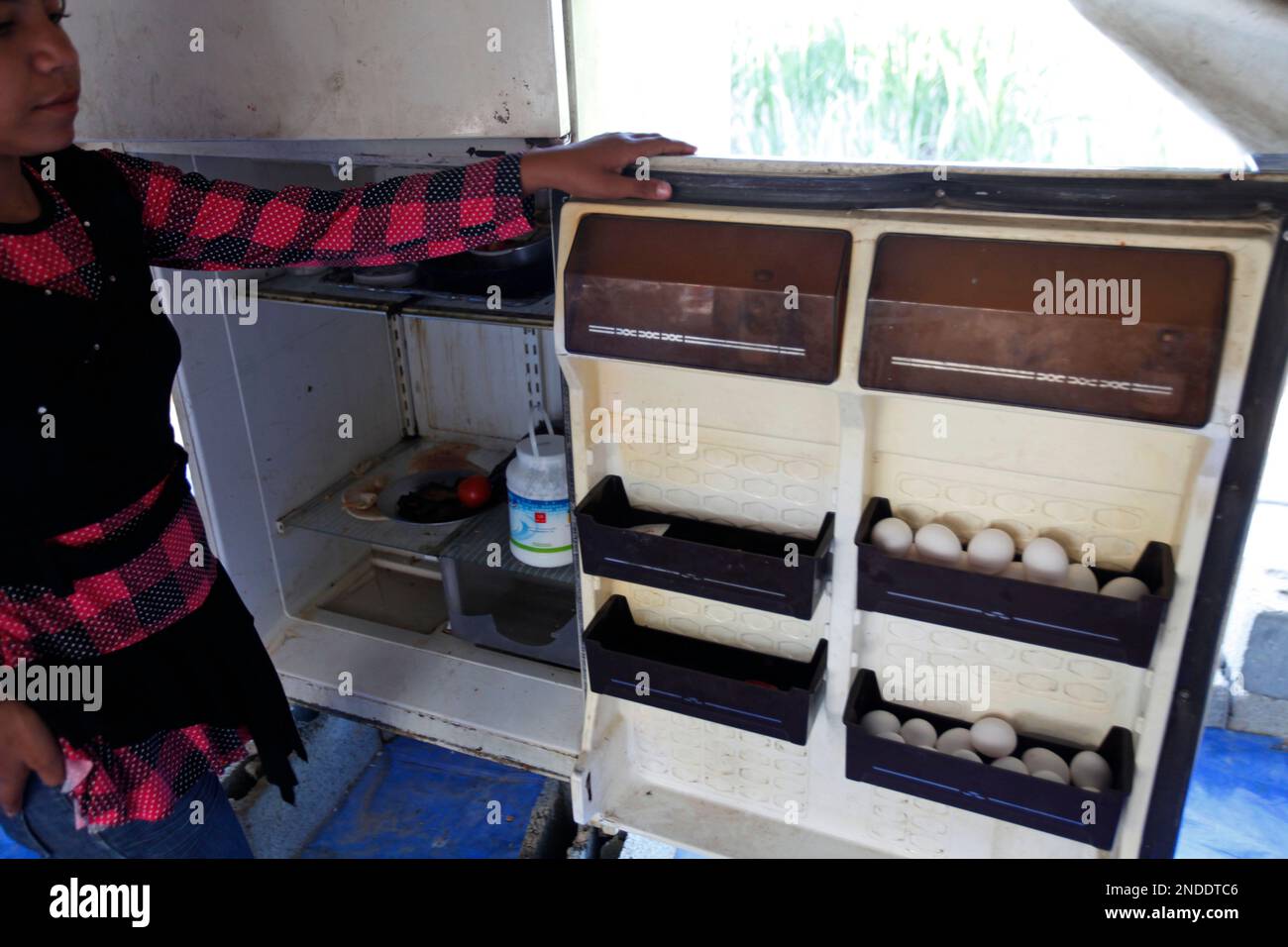** FOR RELEASE MONDAY, JULY 19 ** Palestinian Omsyat Awaja, 13, opens a ...