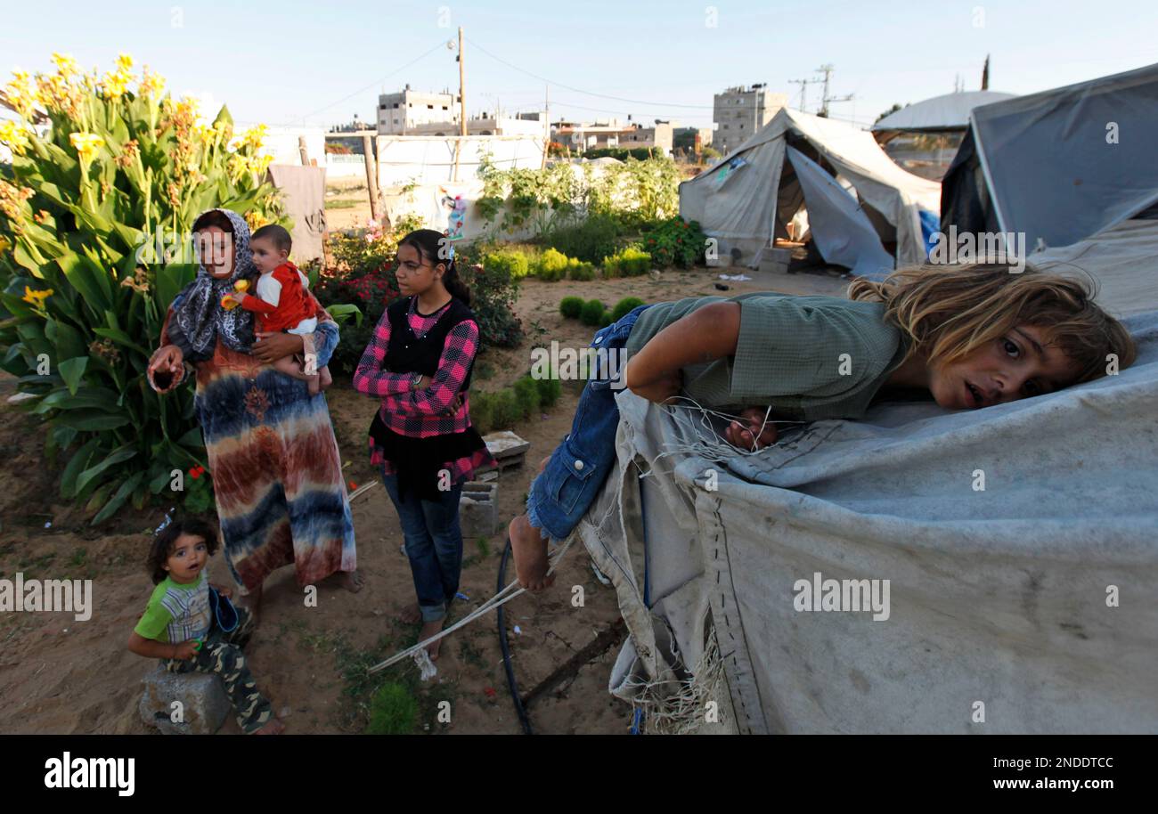 ** FOR RELEASE MONDAY, JULY 19 ** Members of the Palestinian Awaja ...