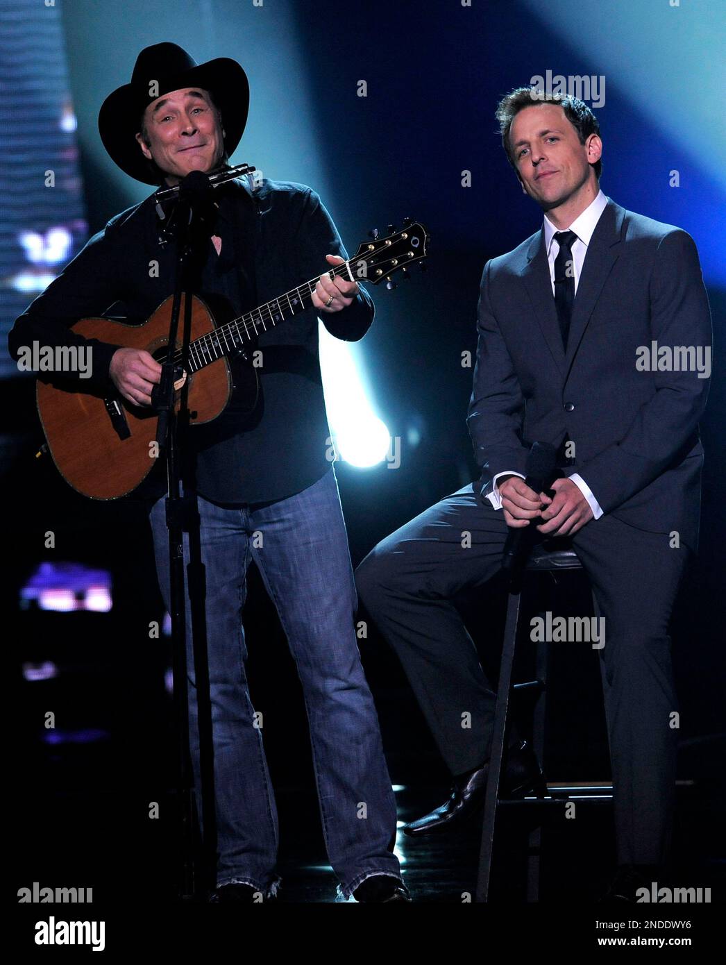 Clint Black, left, and Seth Mayer are seen at the ESPY Awards on ...