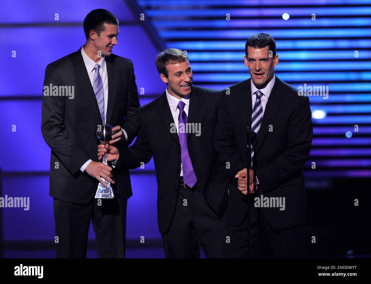 Northern Iowa coach Ben Jacobson, right, accepts the award for best ...