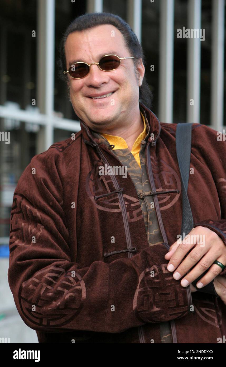 FILE - In this May 18, 2006 file photo actor Steven Seagal smiles on ...