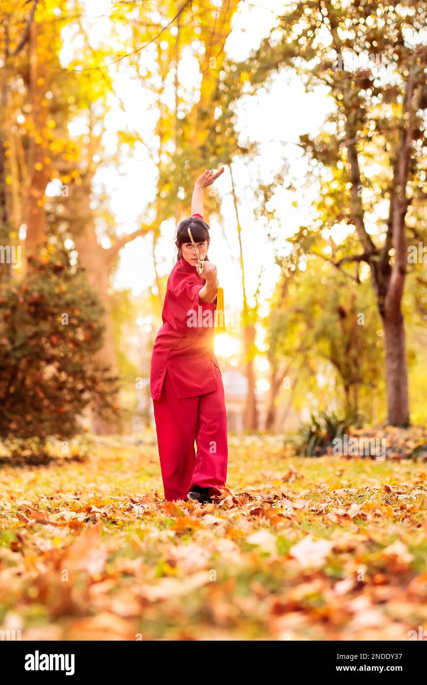 martial arts mid latin woman wushu kung-fu sword. healthy wellness ...