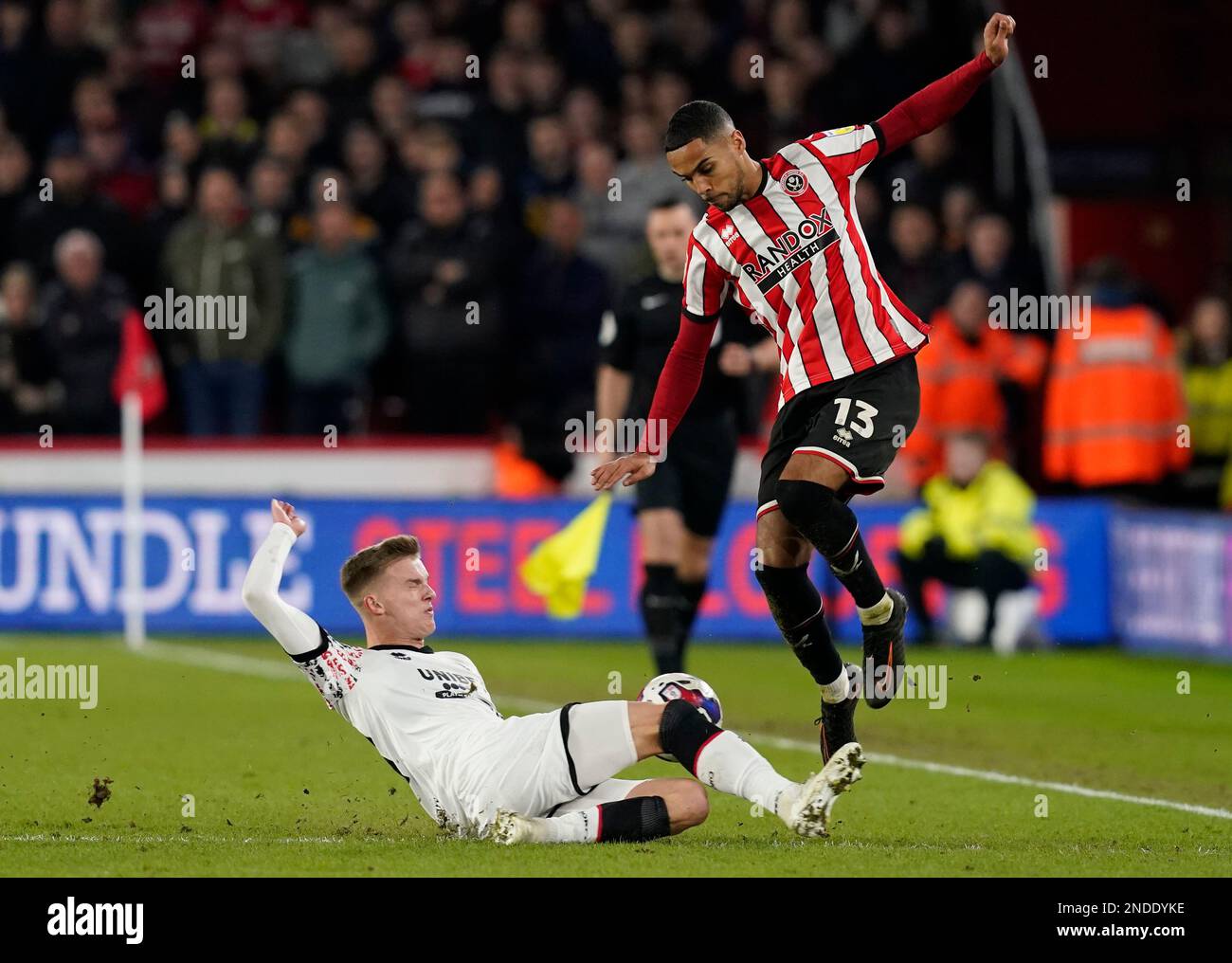 Sheffield, UK. 15th Feb, 2023. Max Lowe of Sheffield Utd is challenged ...