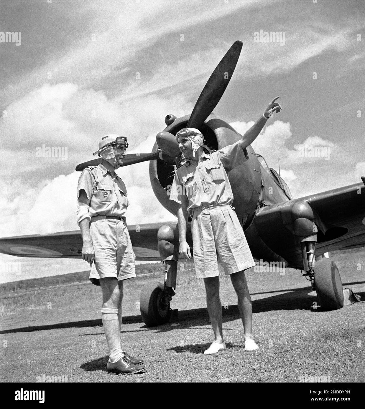 Lt. Charles Varney in flying helmet and his instructor, an unamed ...
