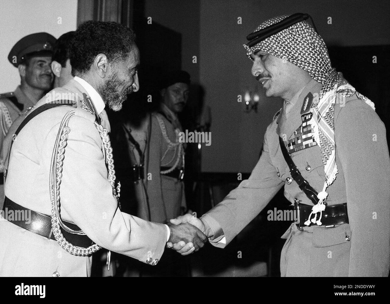 King Hussein of Jordan, right, shakes hands with Emperor Haile Selassie of Ethiopia at the Royal ...