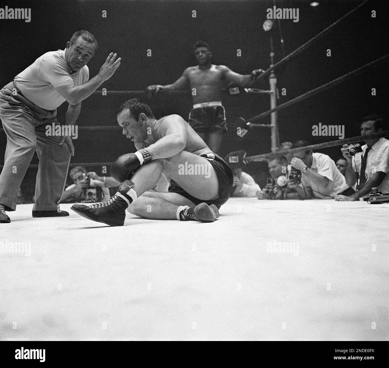 Ingemar Johansson is counted out by referee Billy Regan in sixth round ...