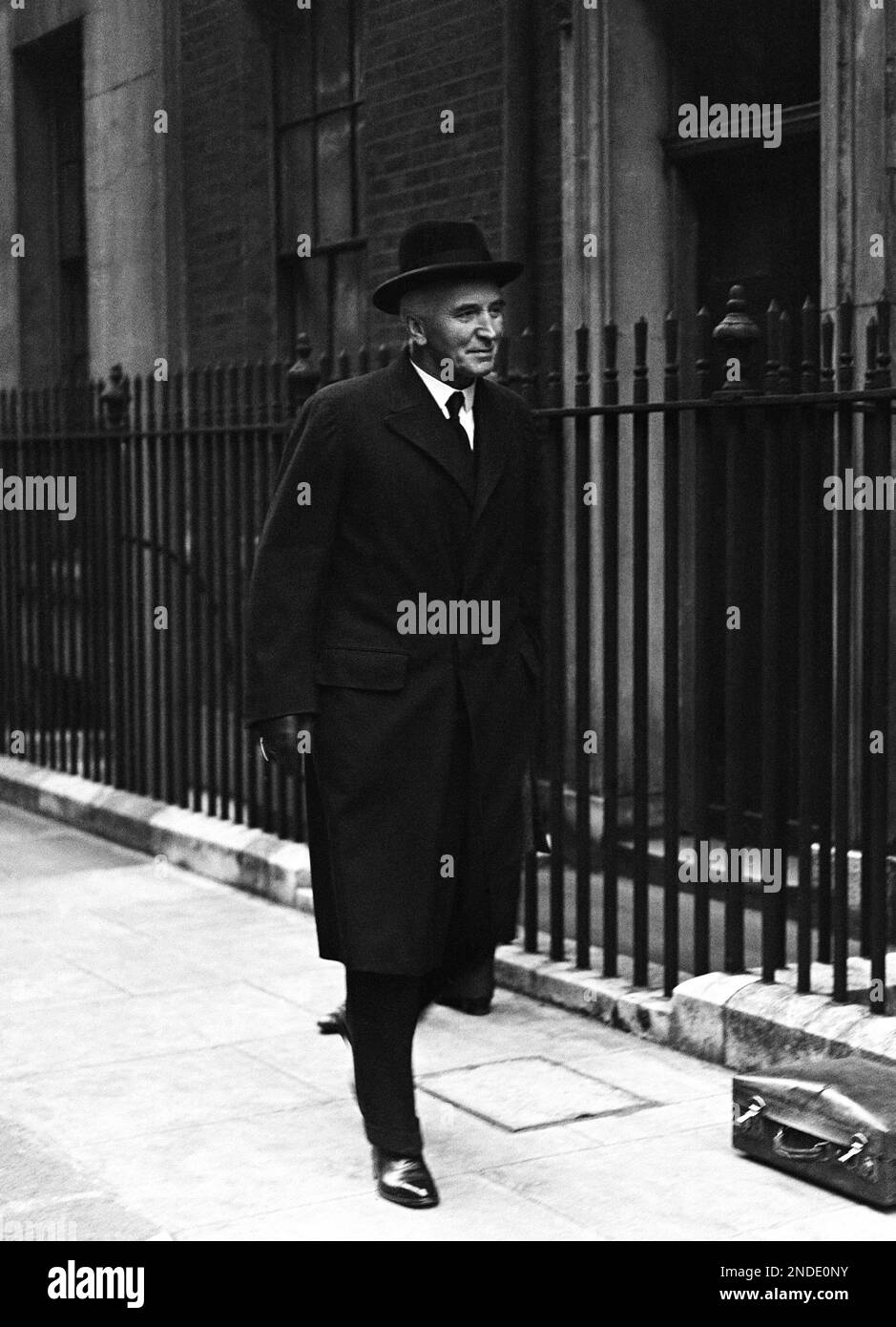 Sir John Simon, Chancellor of the Exchequer arriving at a special ...