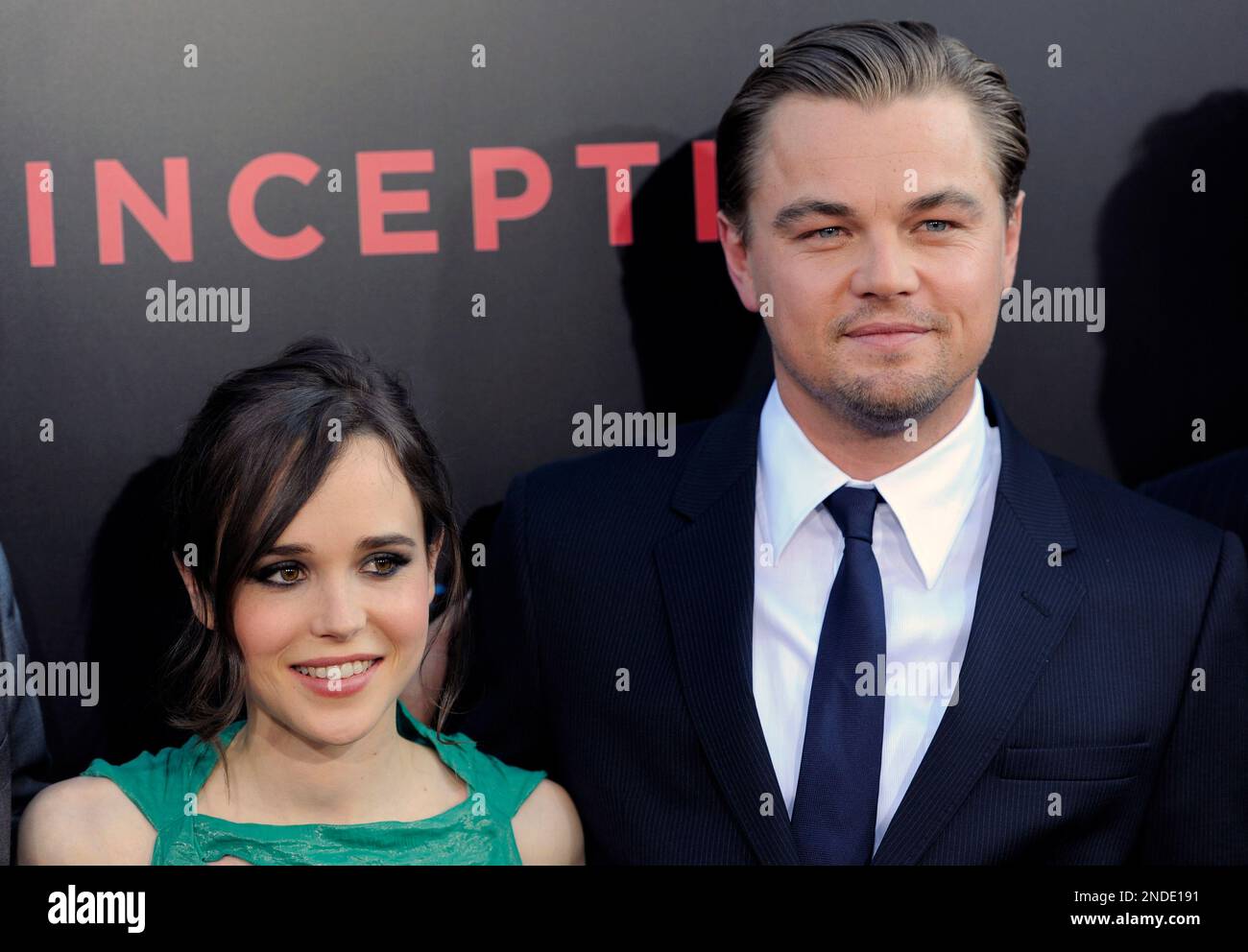 Leonardo DiCaprio and Ellen Page pose together at the premiere of the ...