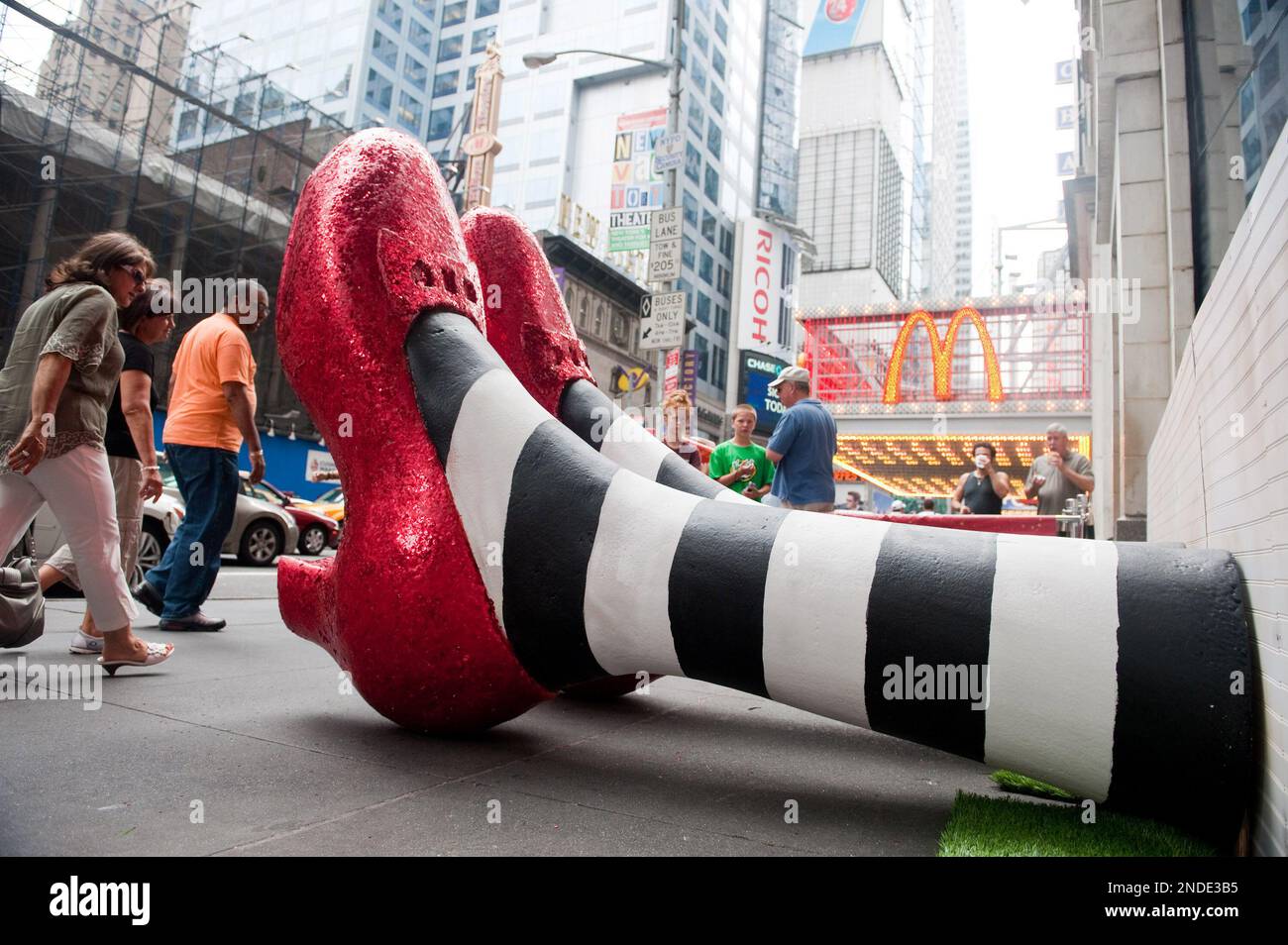 Six-foot tall ruby red slippers are unveiled on 42nd Street outside of ...