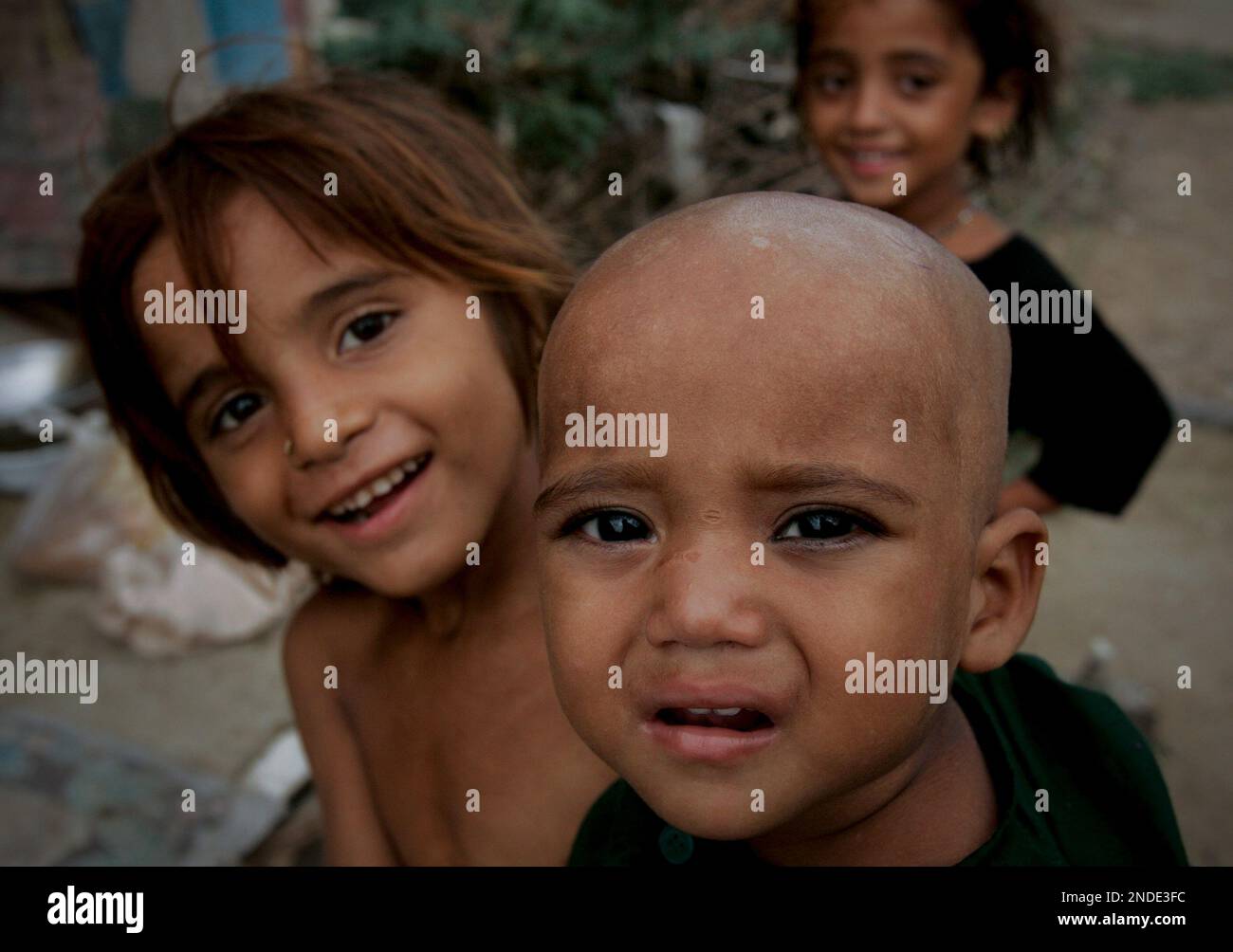 Pakistani children living in slums of Karachi, Pakistan play on Tuesday ...