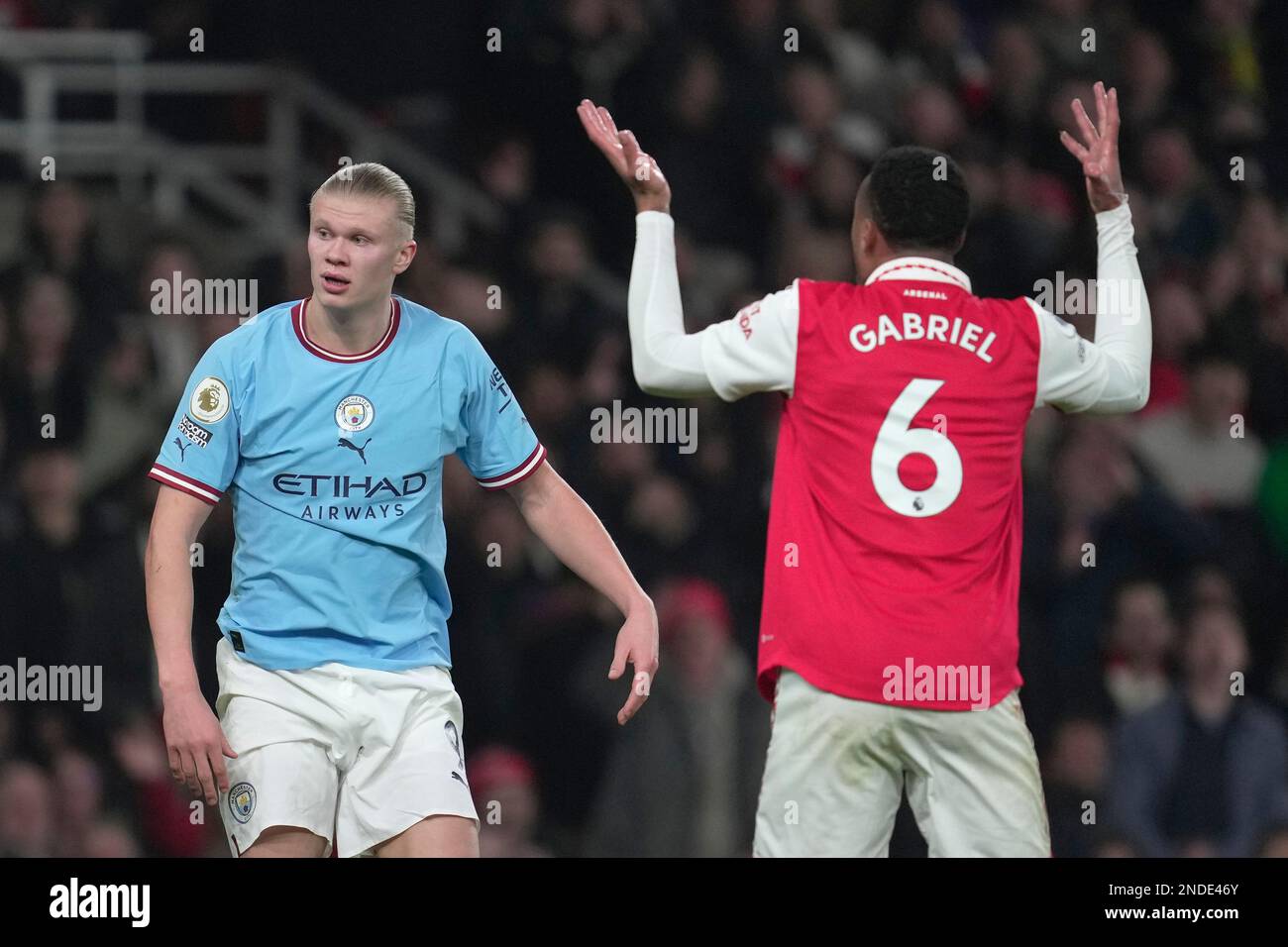 Manchester City's Erling Haaland, left, and Arsenal's Gabriel react during the English Premier ...