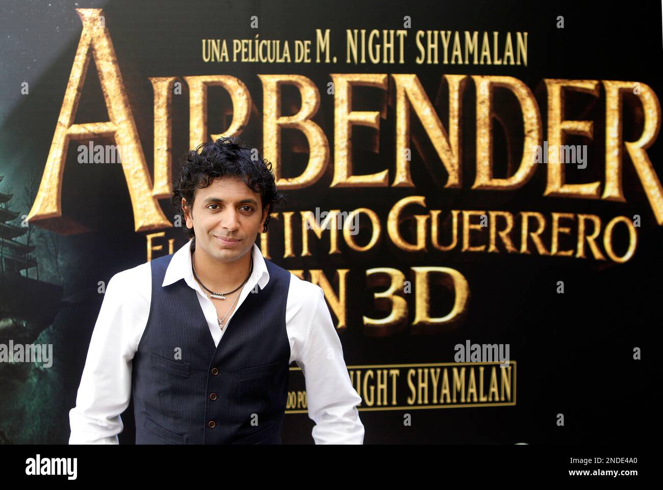 Film director M. Night Shyamalan poses during a photo call to promote ...