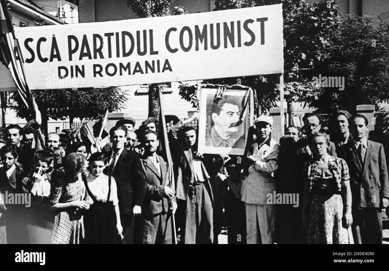 A portrait of Marshal Joseph Stalin being carried through the streets ...