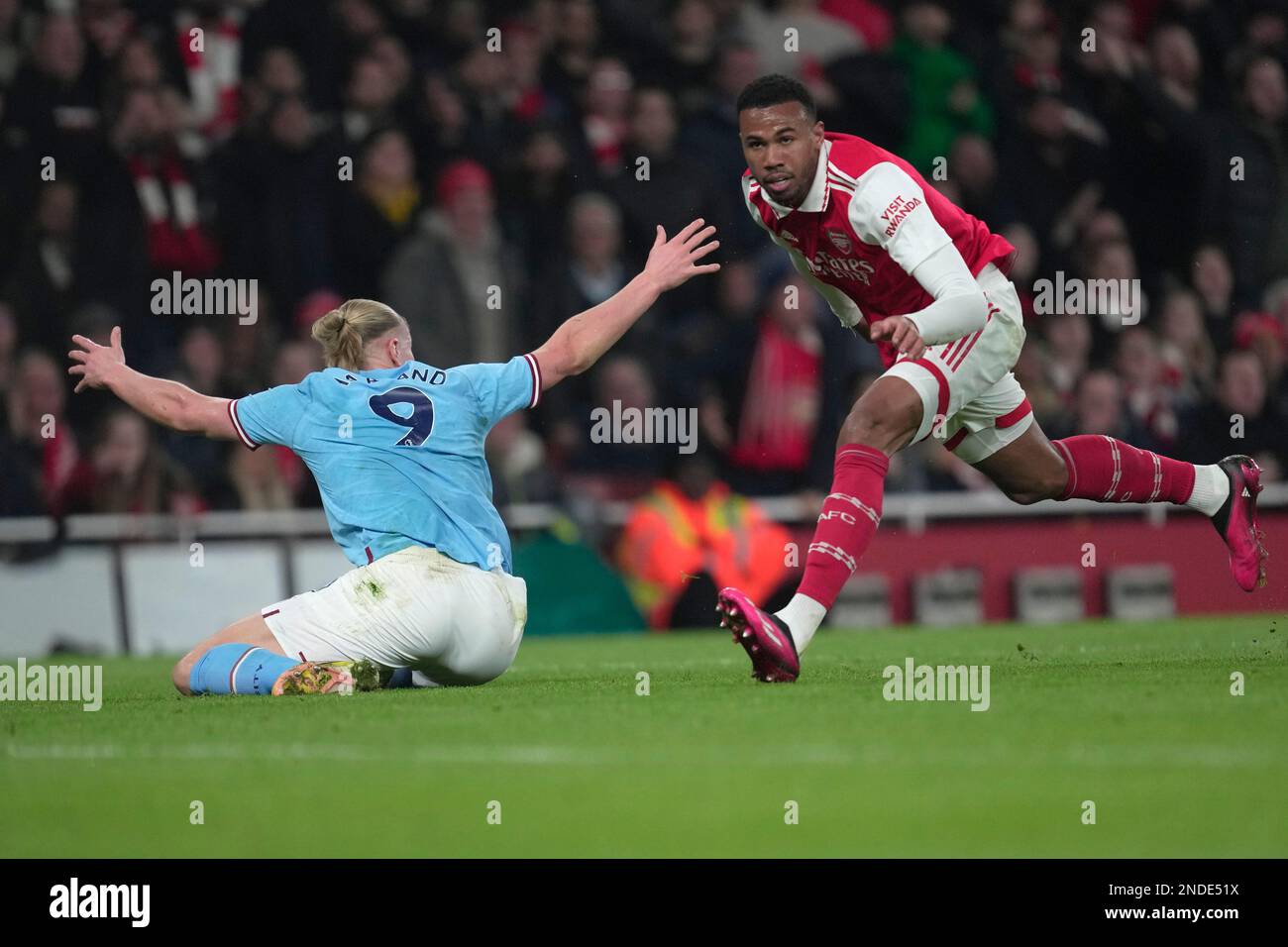 Manchester City's Erling Haaland, left, and Arsenal's Gabriel react during the English Premier ...