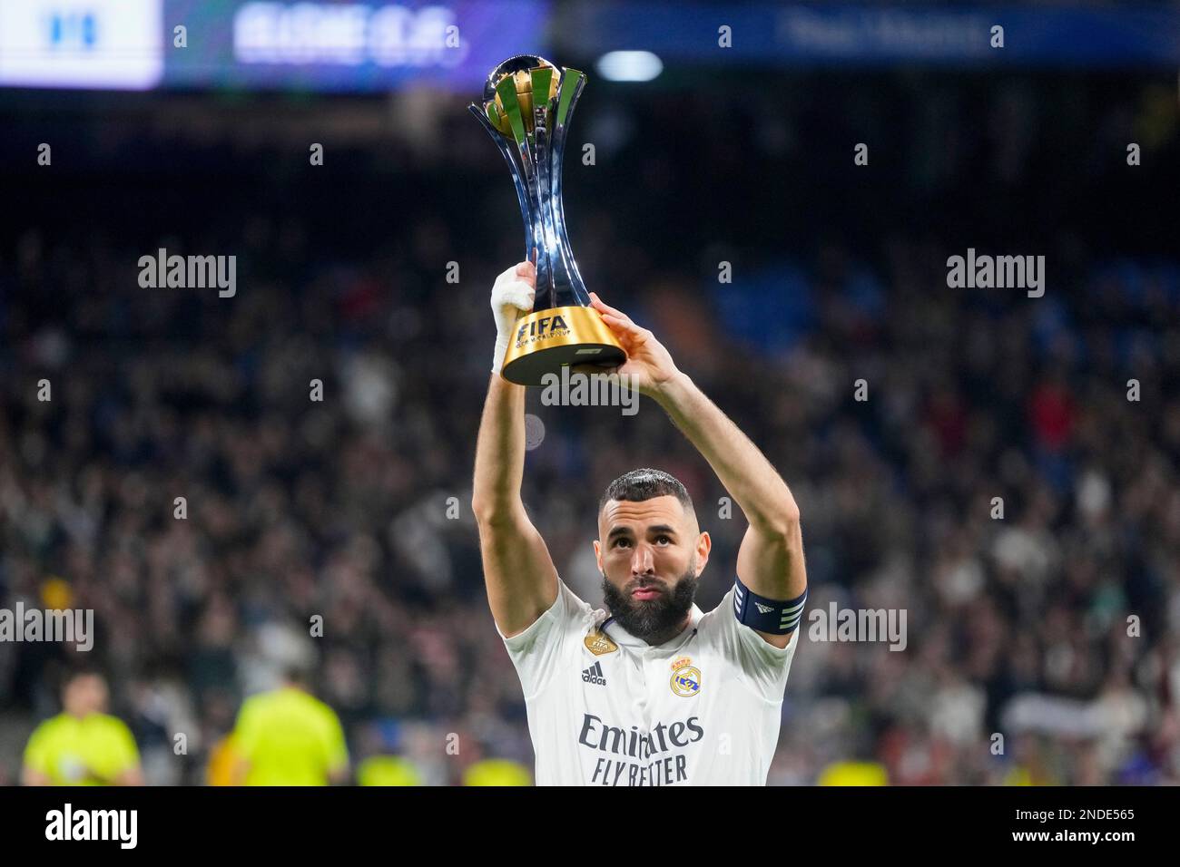 Real Madrid's Karim Benzema holds up the FIFA Club World Cup trophy ...