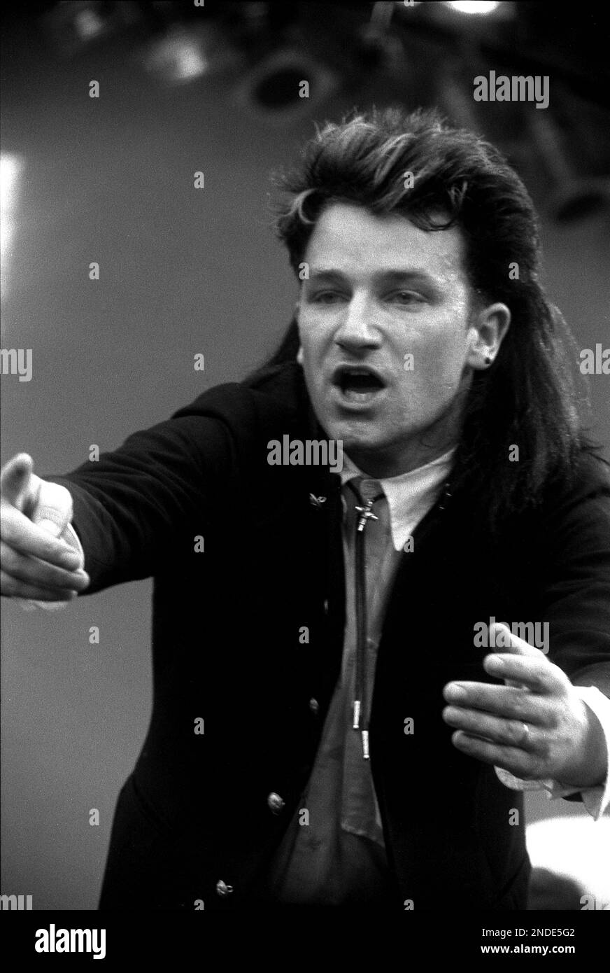 Bono beckons girl on stage at Live Aid on 13 July 1985 at Wembley ...