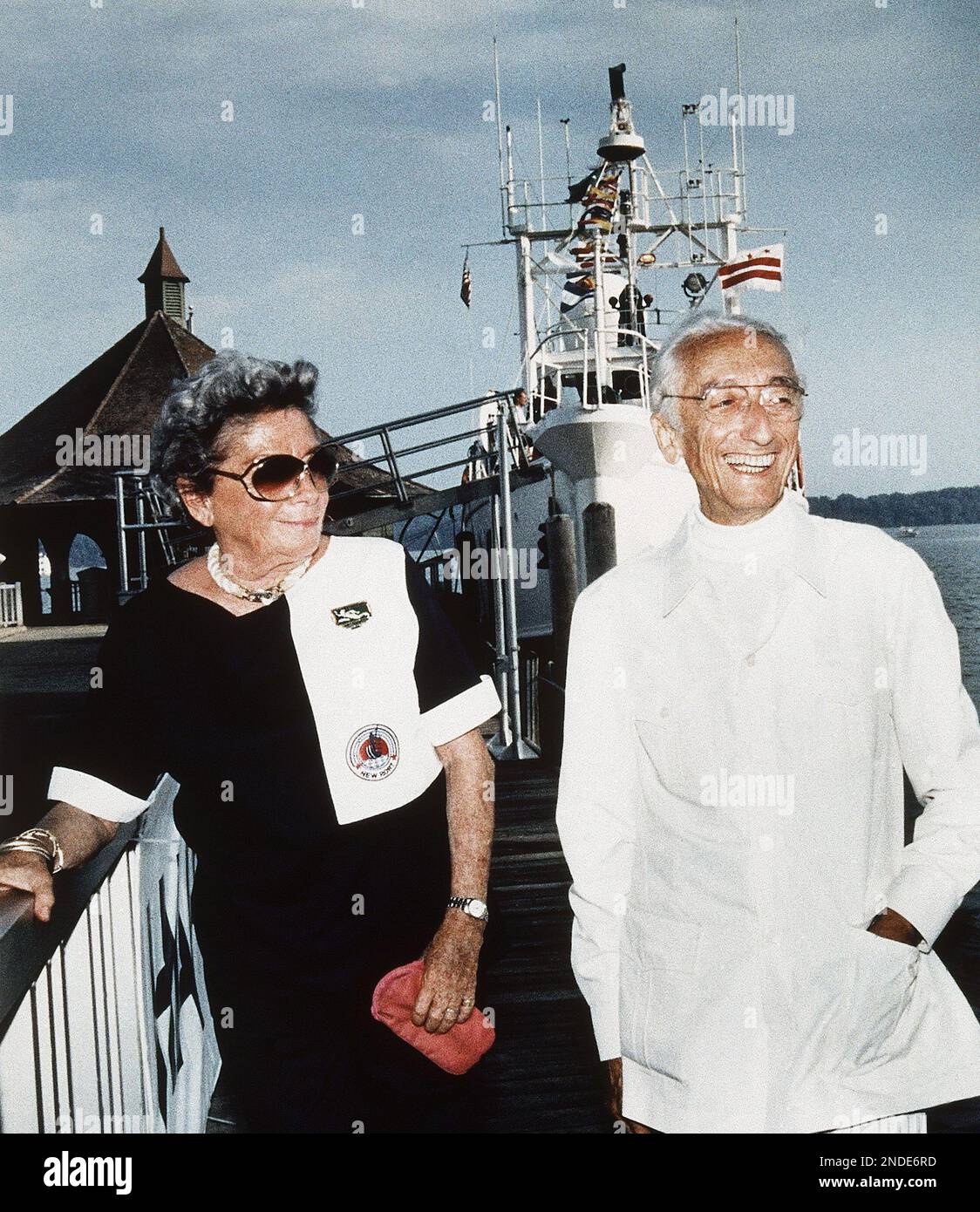 Jacques Cousteau laughs as his wife, Janice, looks during his 75th ...