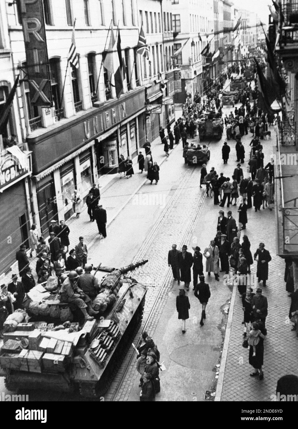 Men of General Hodge’s First Army were accorded a warm welcome when ...