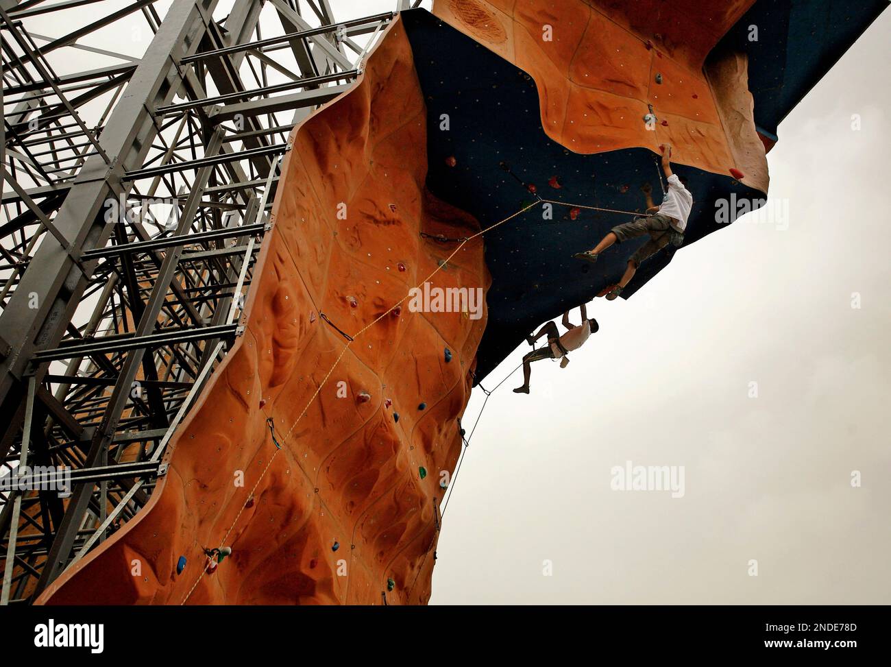 Climbers demonstrate their skill on a newly-inaugurated international ...
