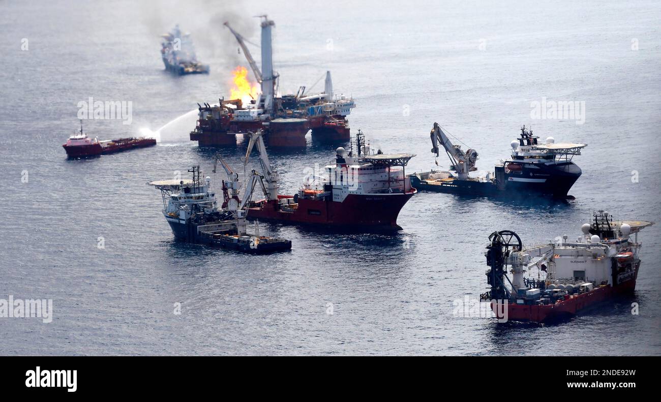 Ships gather around the Helix Q4000 as oil containment efforts continue ...