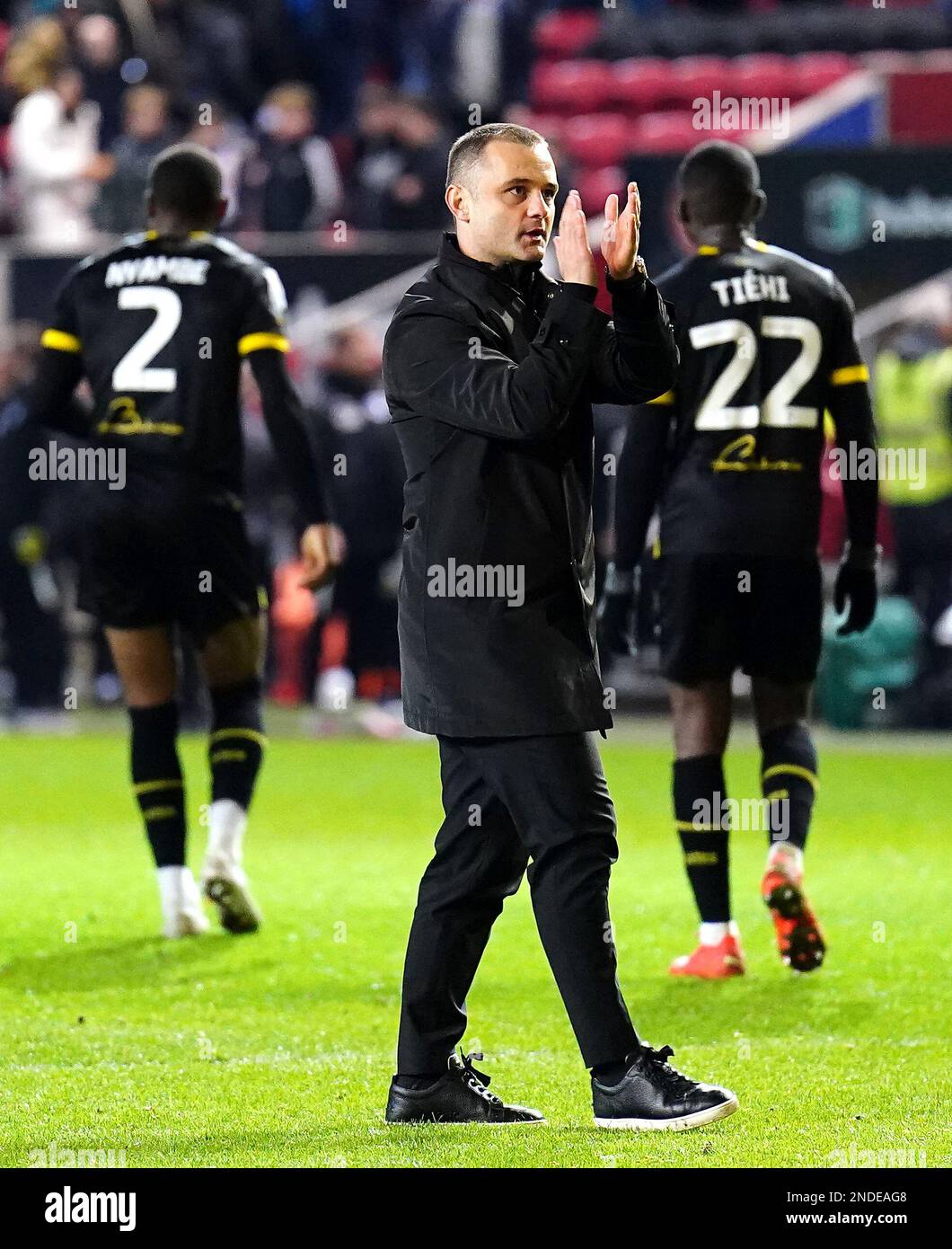 Wigan Athletic manager Shaun Maloney applauds the fans after the final ...