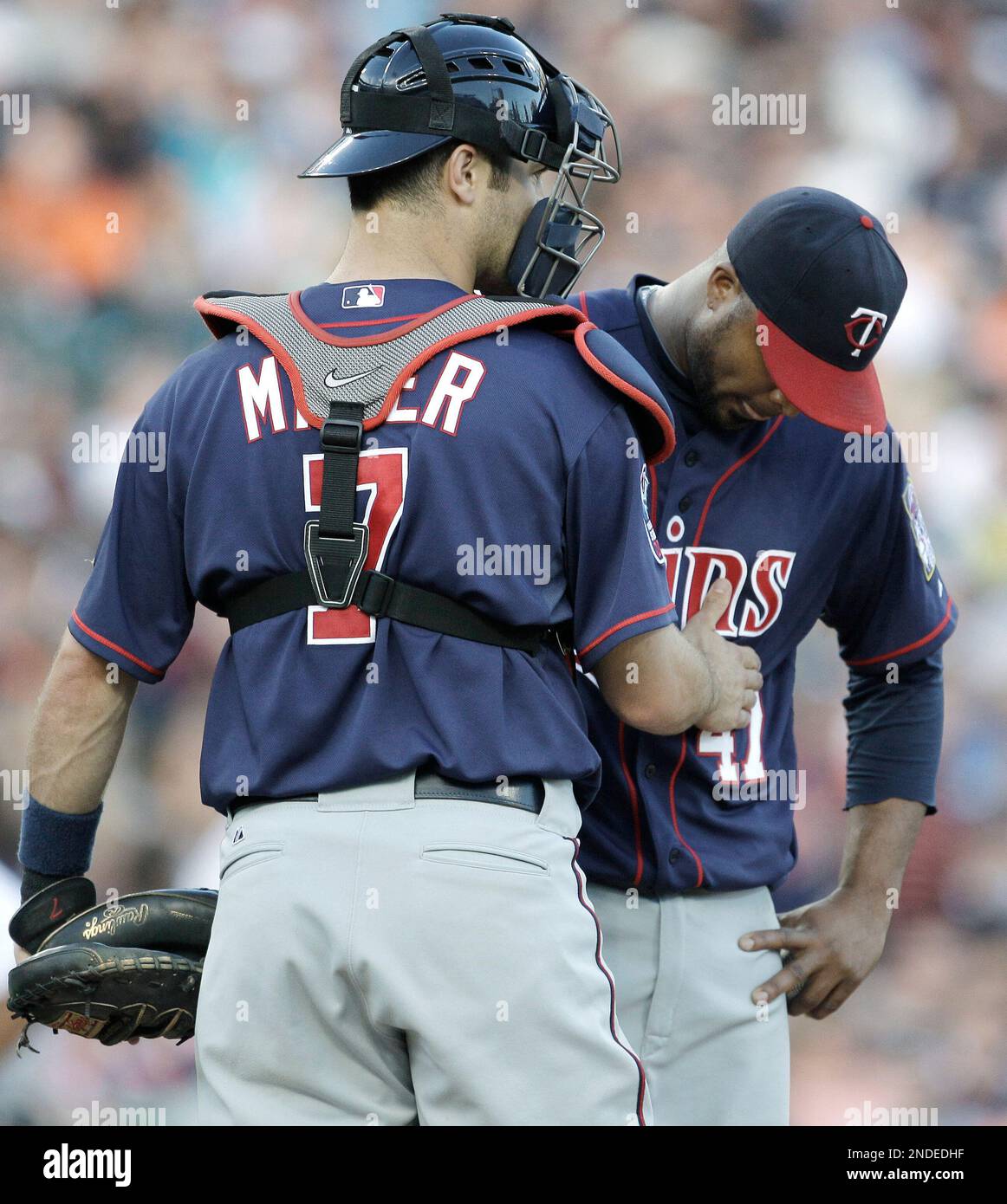 Minnesota Twins catcher Joe Mauer talks with pitcher Francisco Liriano ...