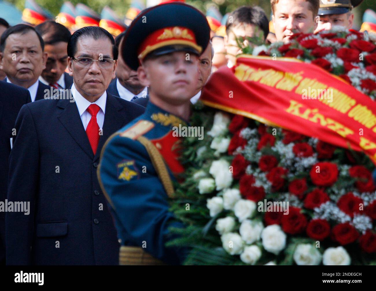 Vietnamese Communist Party General Secretary Nong Duc Manh, second left ...