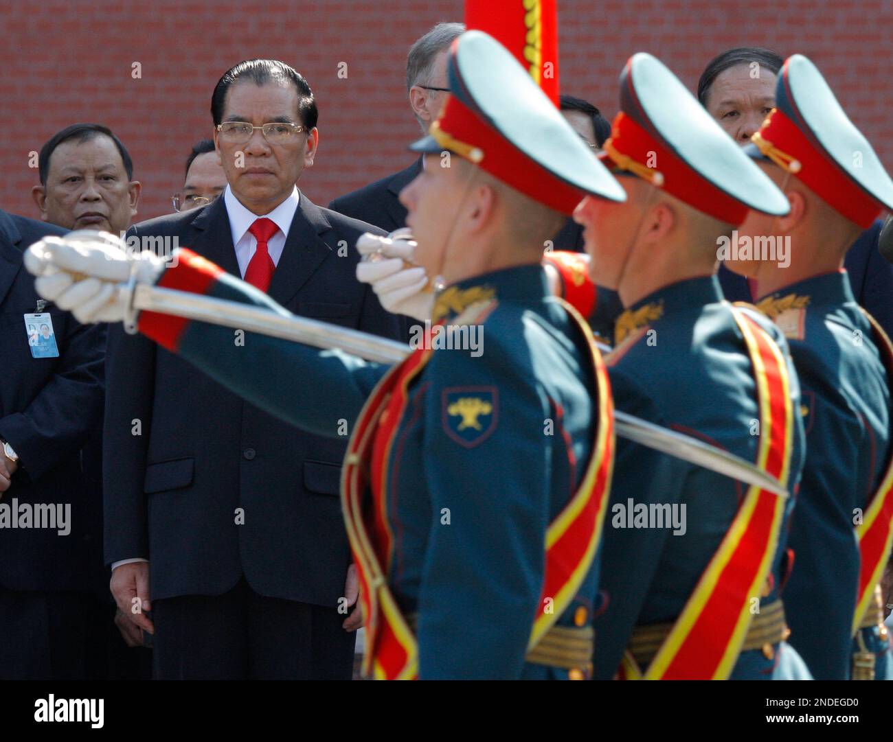 Vietnamese Communist Party General Secretary Nong Duc Manh, second left ...