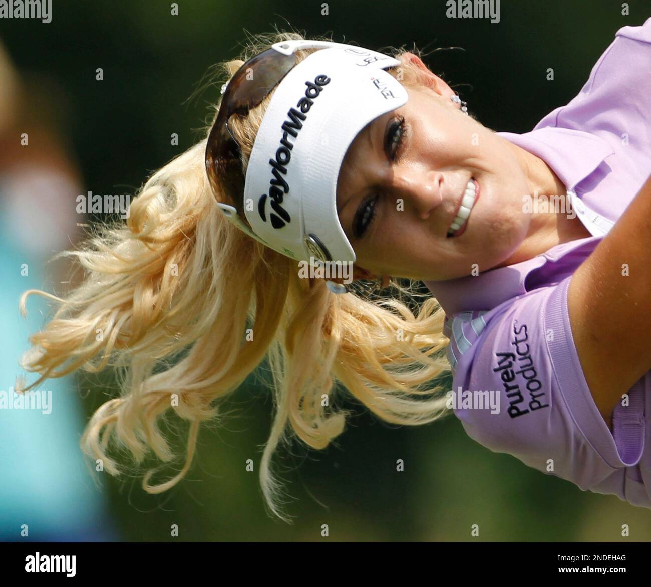Natalie Gulbis watches her tee shot on the 13th hole during the first ...