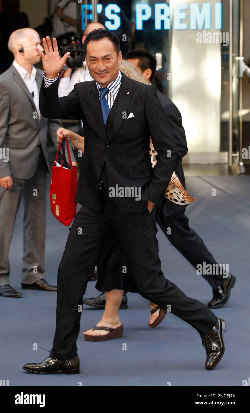 Cast member Japanese actor Ken Watanabe waves as he arrives for the ...