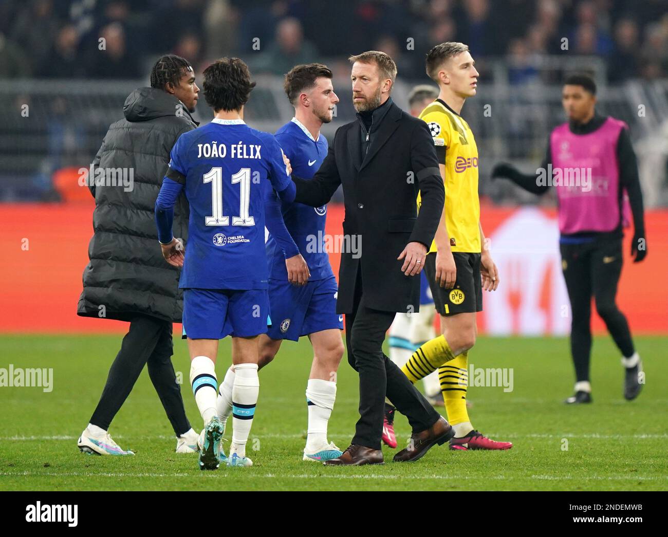 Chelsea manager Graham Potter greets Joao Felix following the UEFA ...