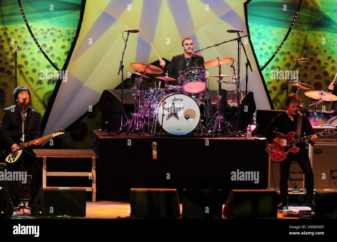 Musician Ringo Starr, center, performs with Wally Palmar and Rick ...