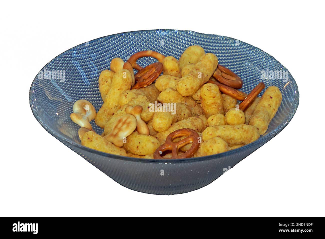 Salty food snacks pile inside glass bowl isolated on white background ...