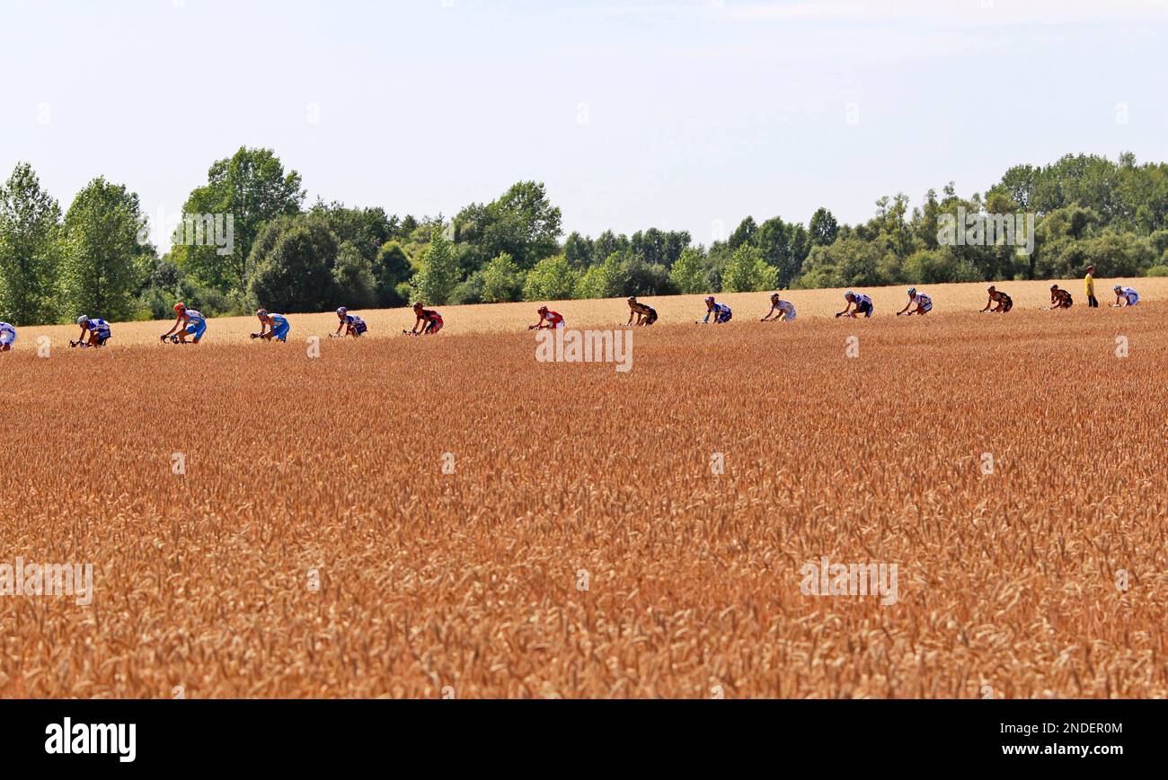 The pack rides during the fourth stage of the Tour de France cycling ...