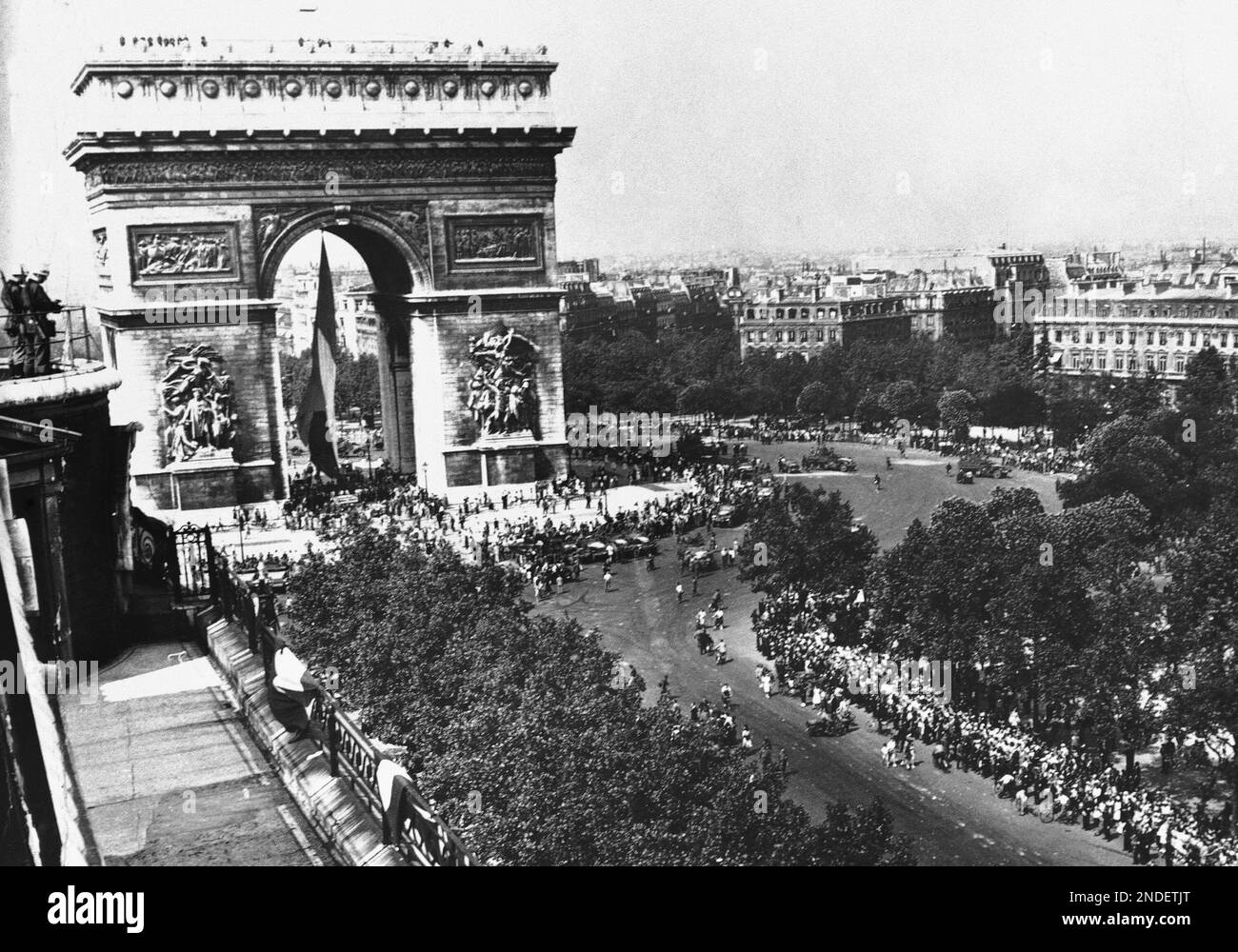 A striking view of the Arc de Triomphe during the celebrations in Paris ...