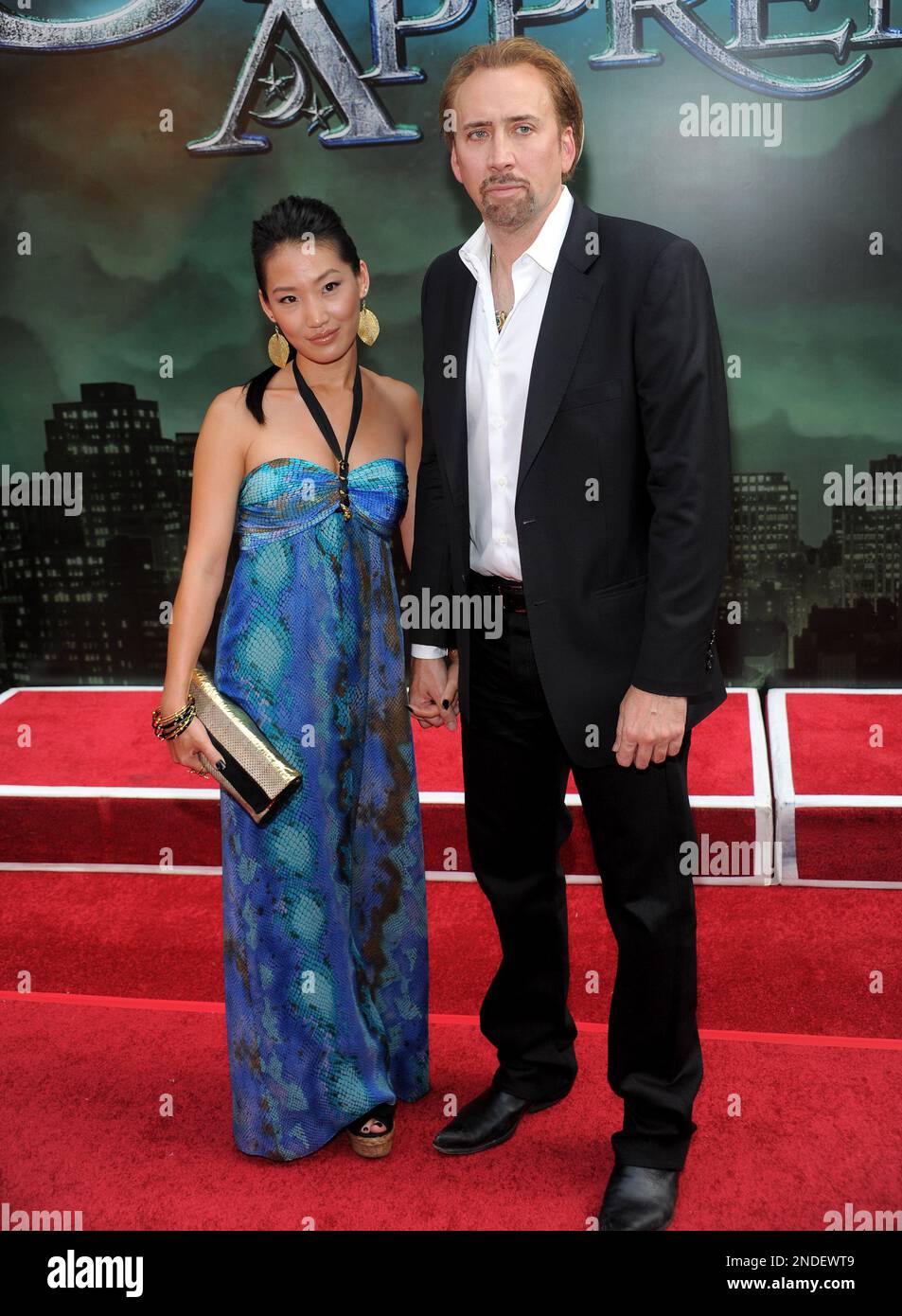 Actor Nicolas Cage and wife Alice Kim Cage attend the world premiere of ...