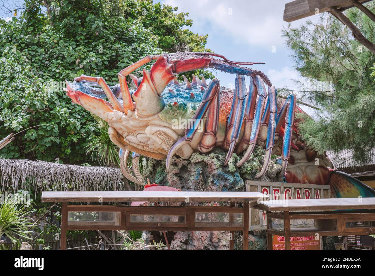 Colorful giant sea crab statue at Sanur beach, side view, tourist ...