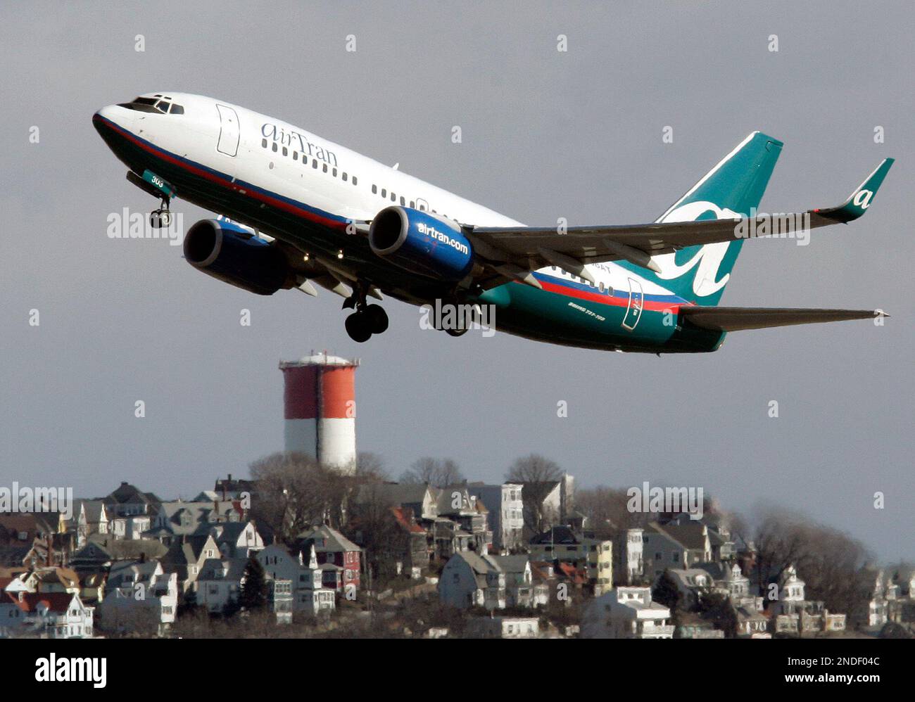 FILE - In this Jan. 26, 2007 file photo, an AirTran plane leaves Logan ...