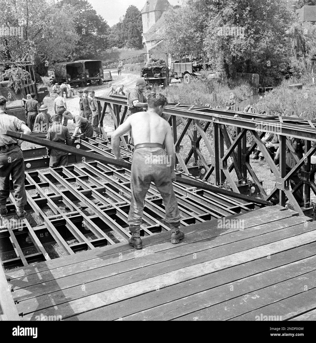 With the Bailey Bridge all the way over the stream, the decking party ...