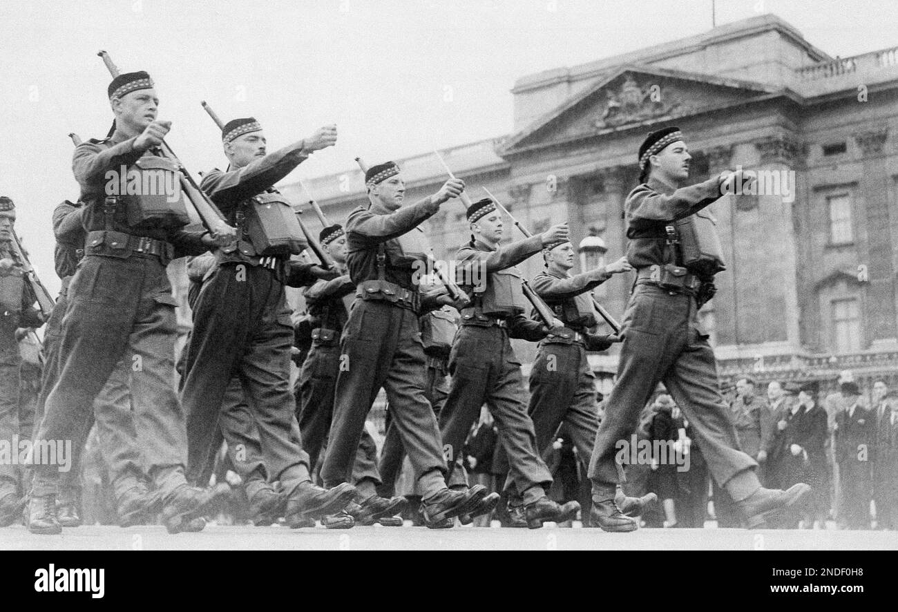 With the proud marching snap of their famous regiment, Toronto Scottish ...