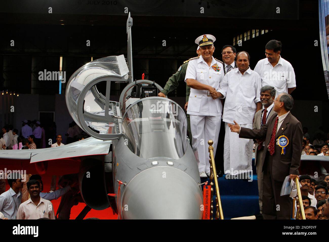 Indian Defense Minister A.K.Antony, second right, shakes hands with ...