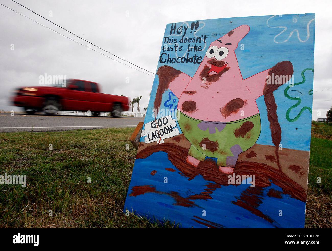 A sign depicting Patrick, a character from the cartoon "SpongeBob ...