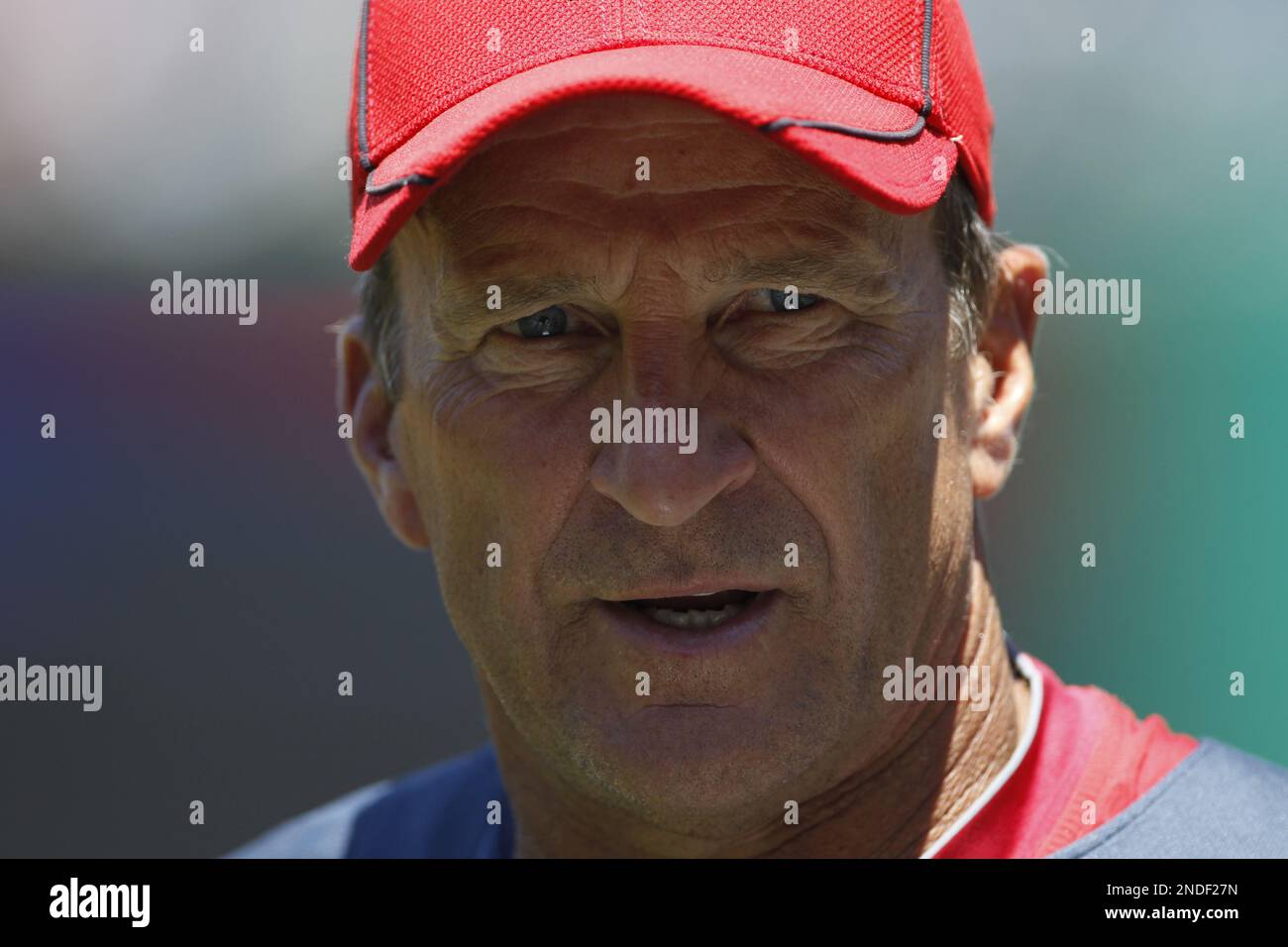 Washington Nationals manager Jim Riggleman talks before a baseball game ...