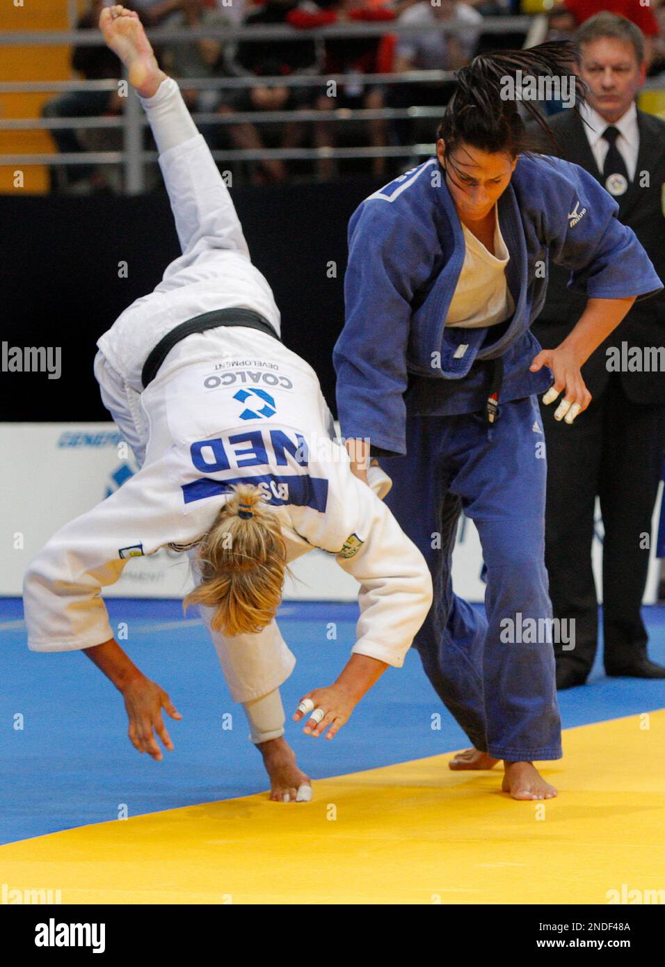 Hungary's Anett Meszaros and Netherlands' Edith Bosch, in white ...