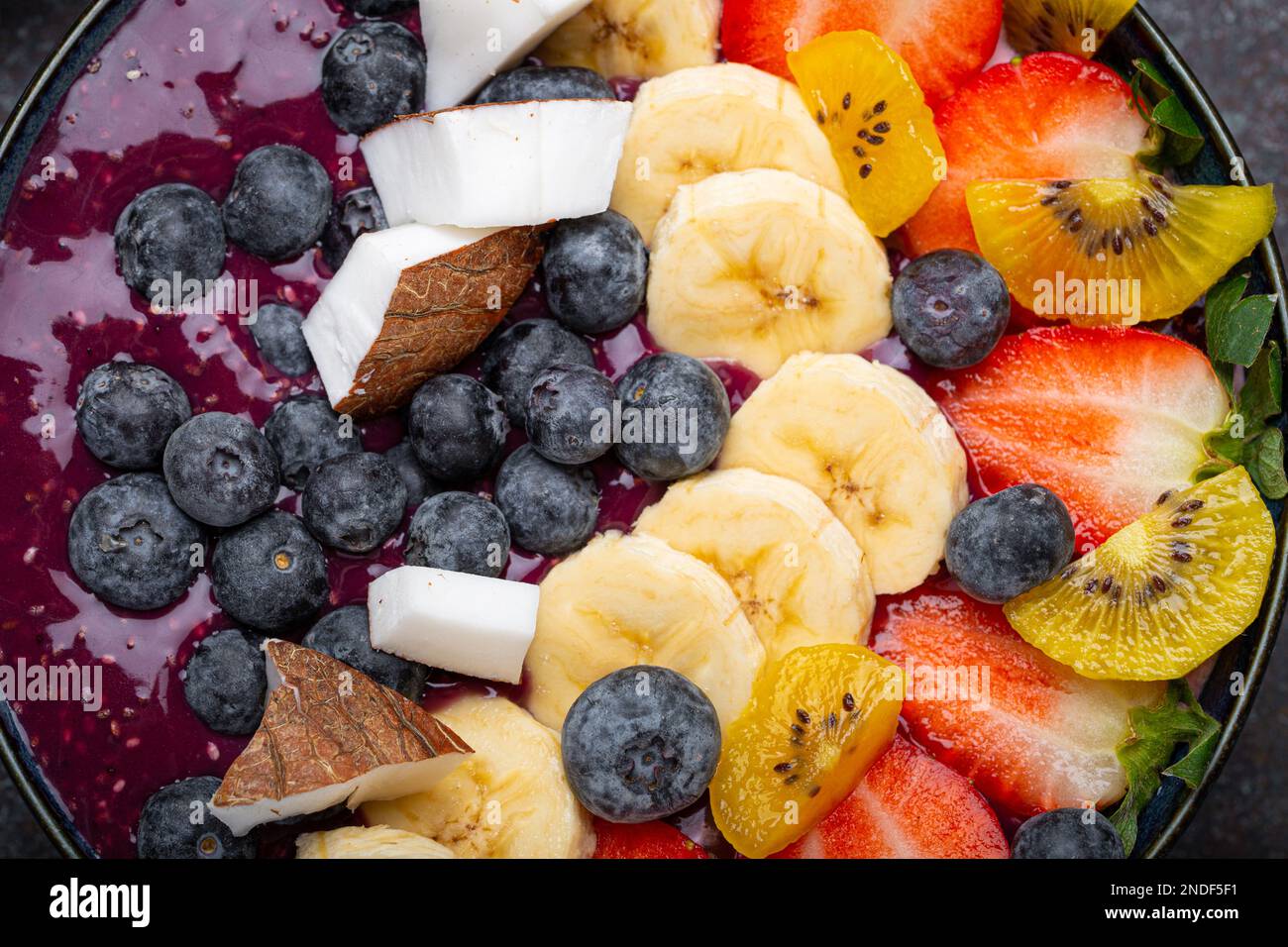 Healthy summer acai smoothie bowl with chia seeds, fresh banana ...