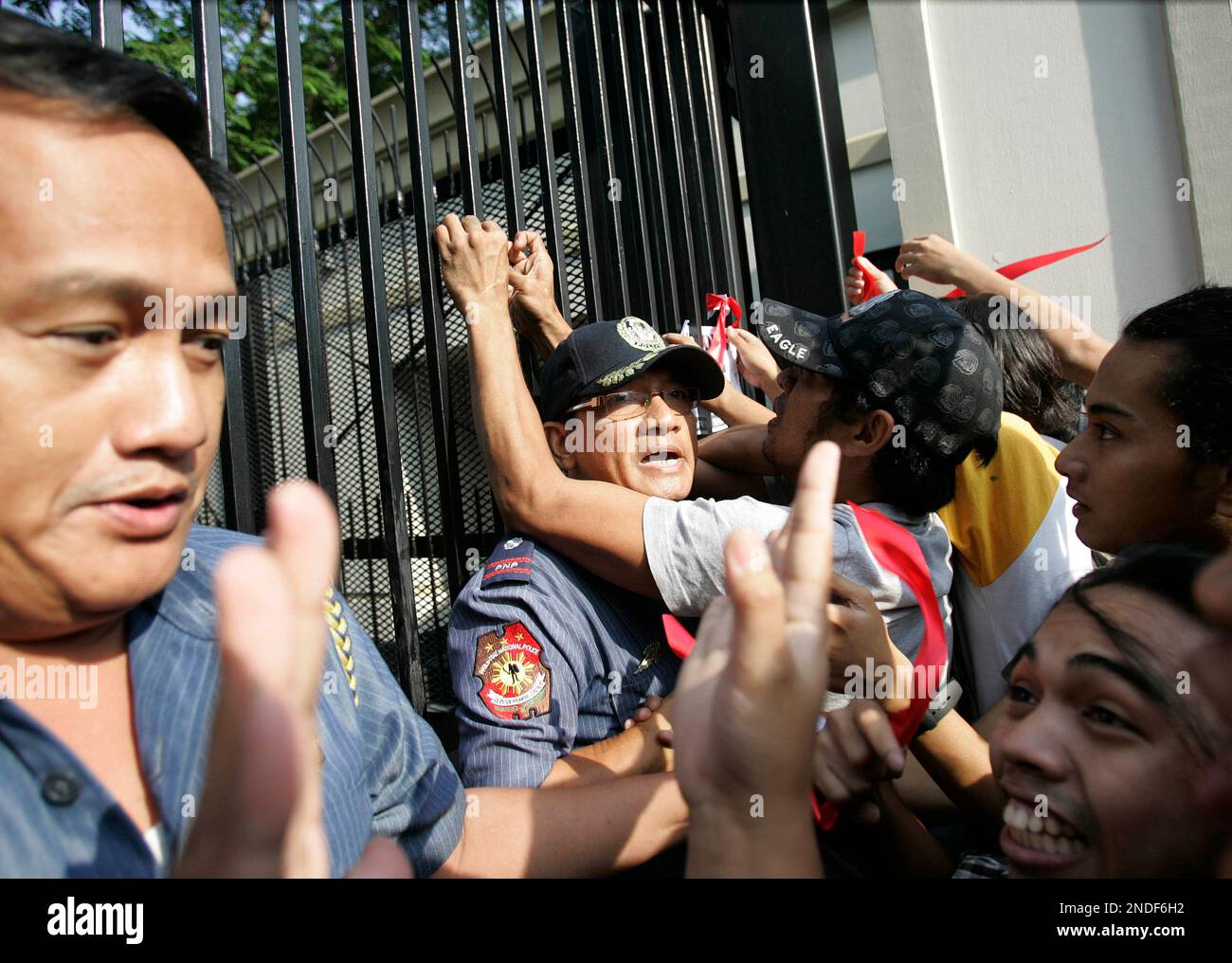 Police try to stop student activists from tying red ribbons with ...