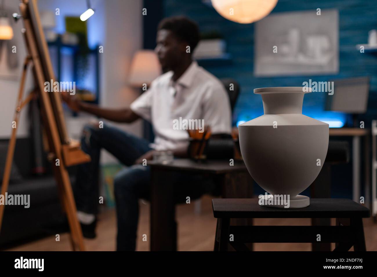 Young african american male art student learning new artistic skills ...