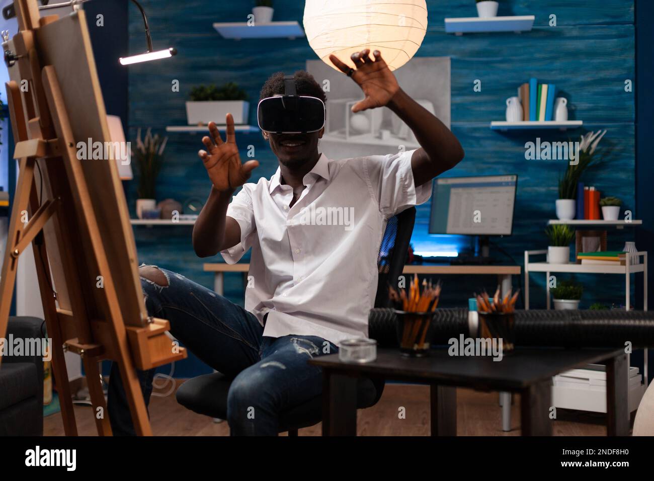 African american artist looking for inspiration in online universe with ...