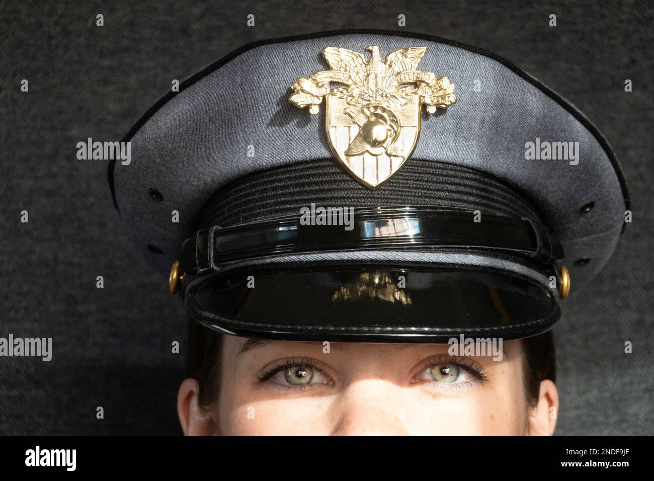 Close-up of a female West Point cadet, wearing her class a duty cap ...